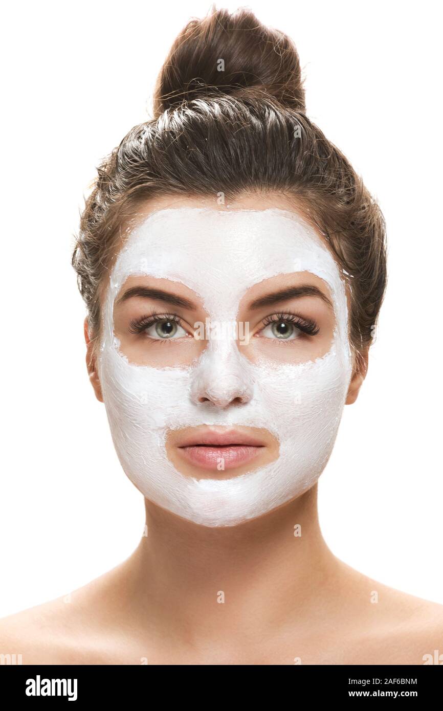 Beautiful woman with facial mask on white background. Skincare and ...