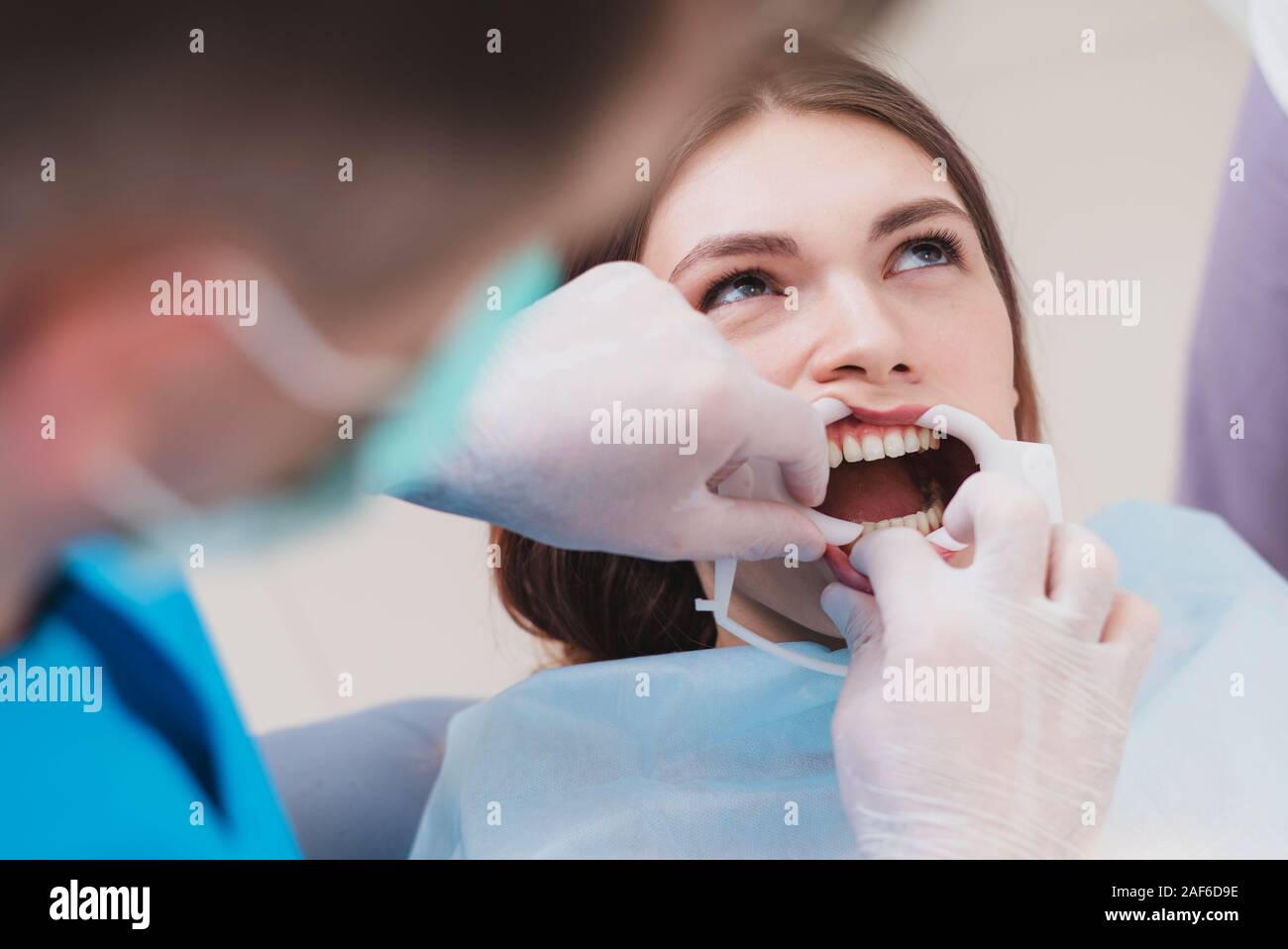 doctor performs the procedure for cleaning teeth Stock Photo - Alamy