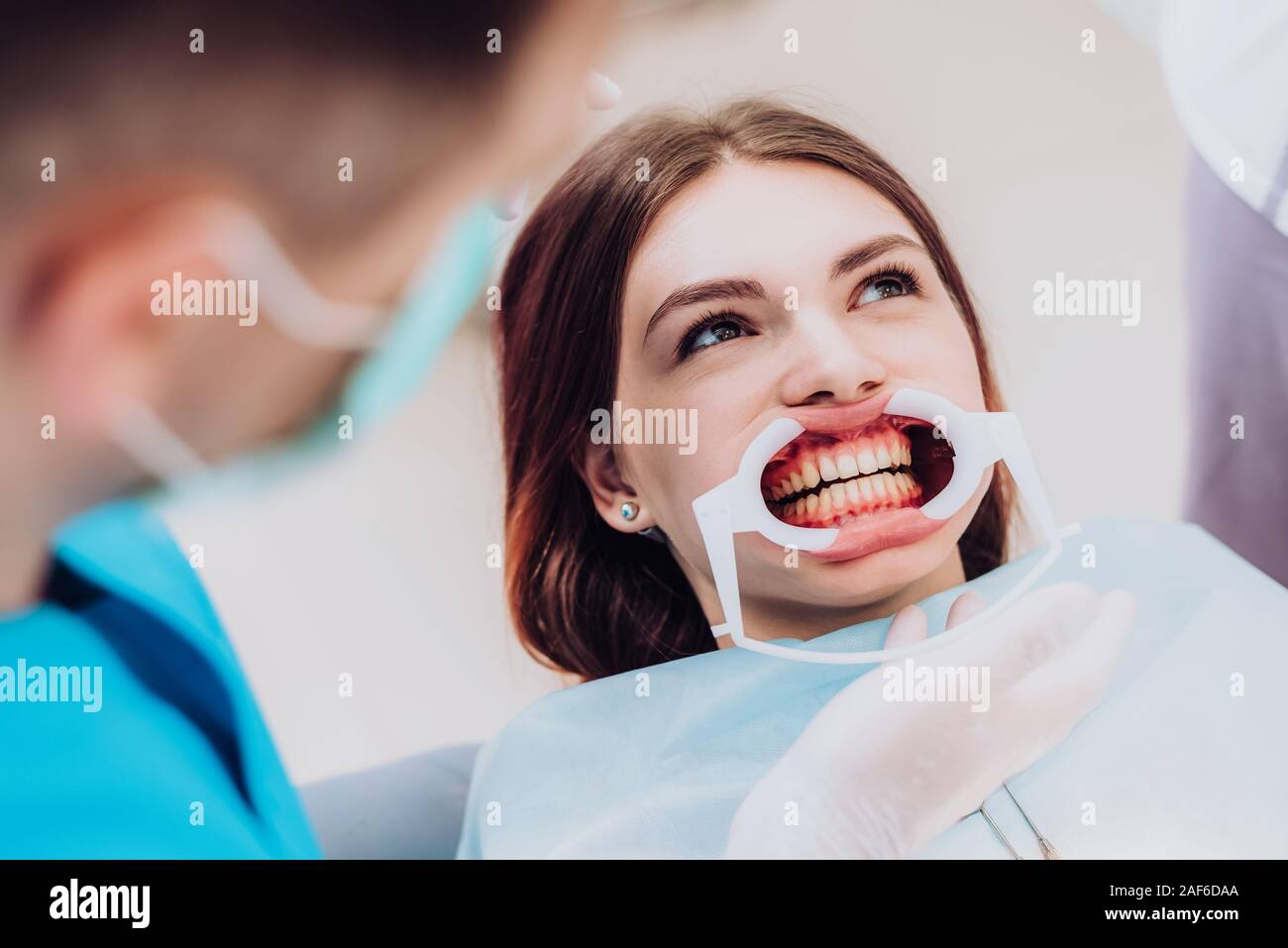 doctor performs the procedure for cleaning teeth Stock Photo - Alamy