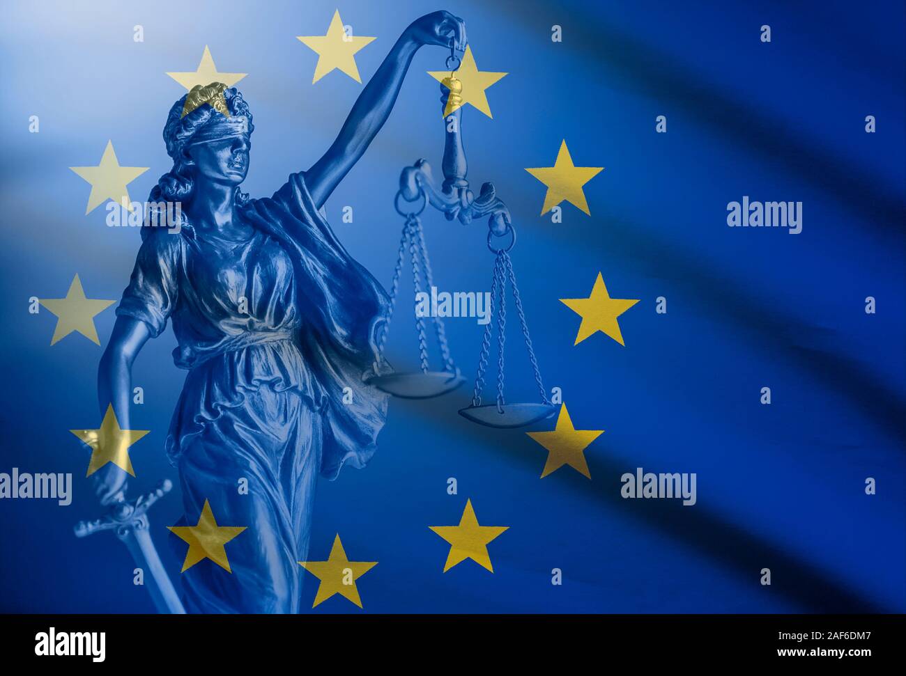 Statue of Justice over a European Union Flag Stock Photo - Alamy
