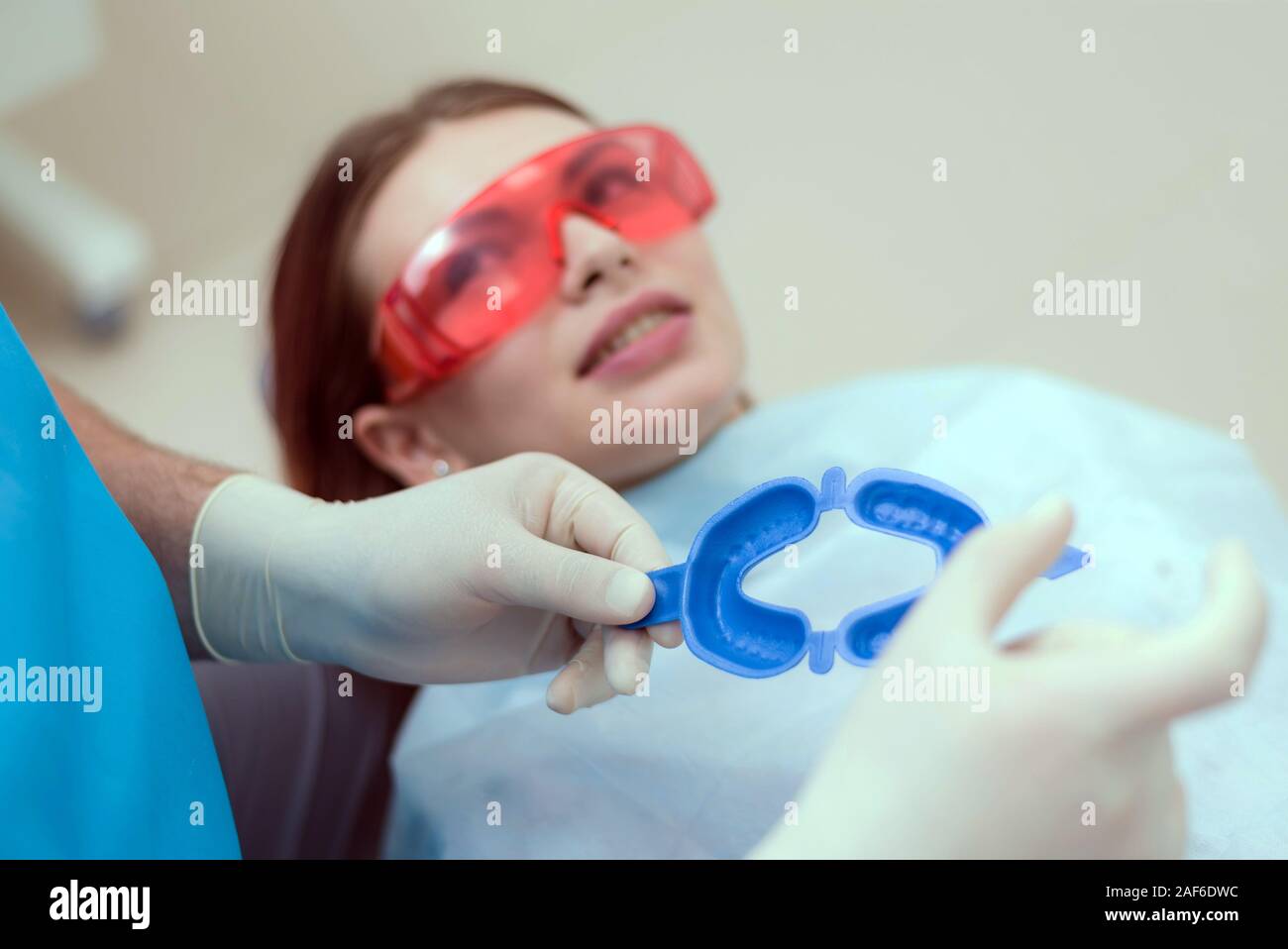 doctor performs the procedure for cleaning teeth Stock Photo - Alamy