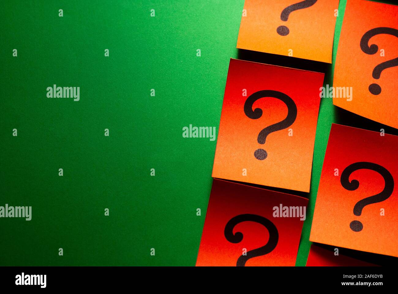 Side border of red cards with question marks Stock Photo - Alamy
