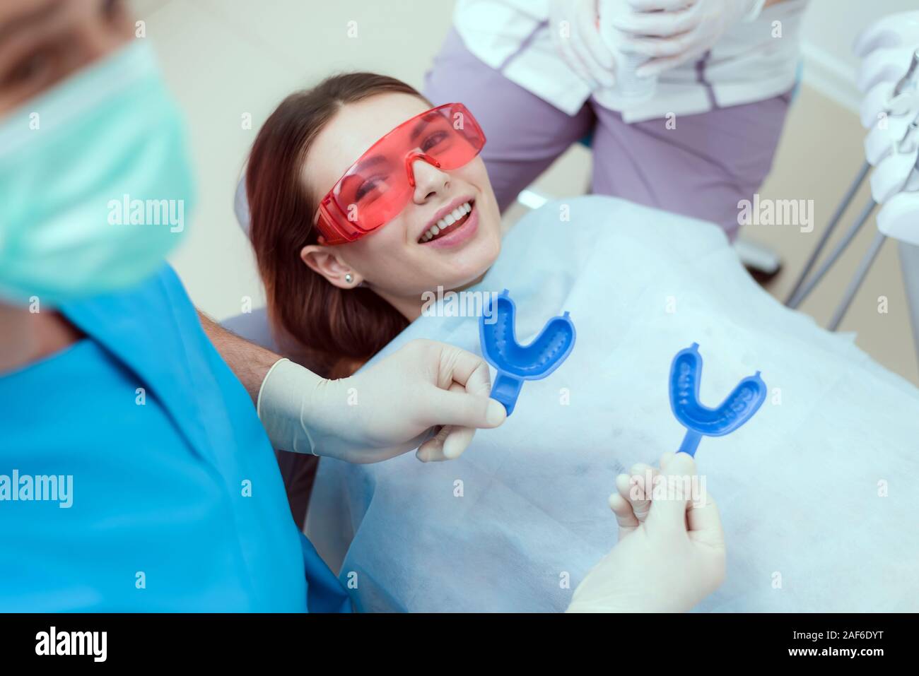 doctor performs the procedure for cleaning teeth Stock Photo - Alamy