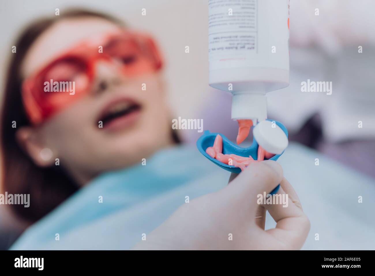 doctor performs the procedure for cleaning teeth Stock Photo - Alamy
