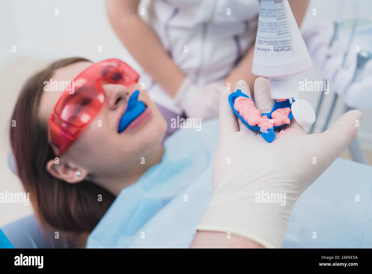 doctor performs the procedure for cleaning teeth Stock Photo - Alamy