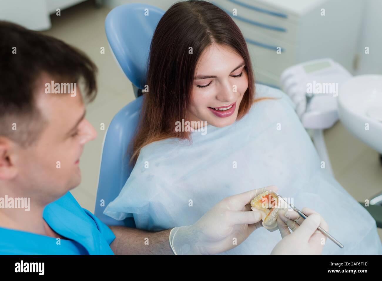 Orthodontist showed how the plate works to flatten teeth on jaws Stock ...
