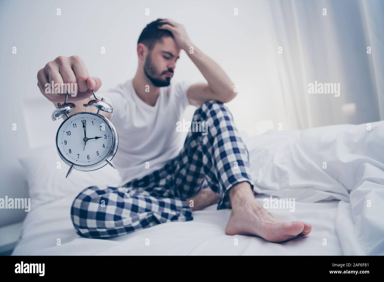 Retro unhappy man in bed hi-res stock photography and images - Alamy