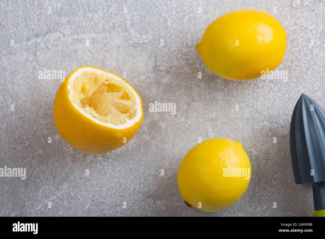 Lemons on gray concrete. Lemon - a source of vitamin C Stock Photo - Alamy