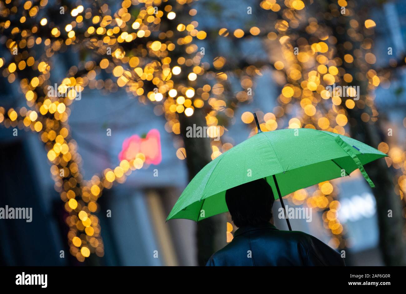 Stuttgart, Germany. 13th Dec, 2019. Early in the morning a pedestrian ...