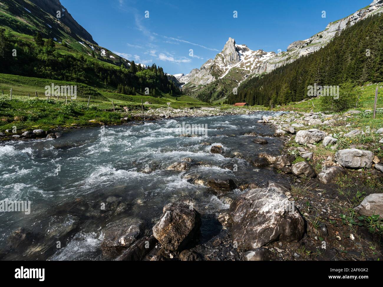 Alpine river in the Swiss Alps Stock Photo - Alamy