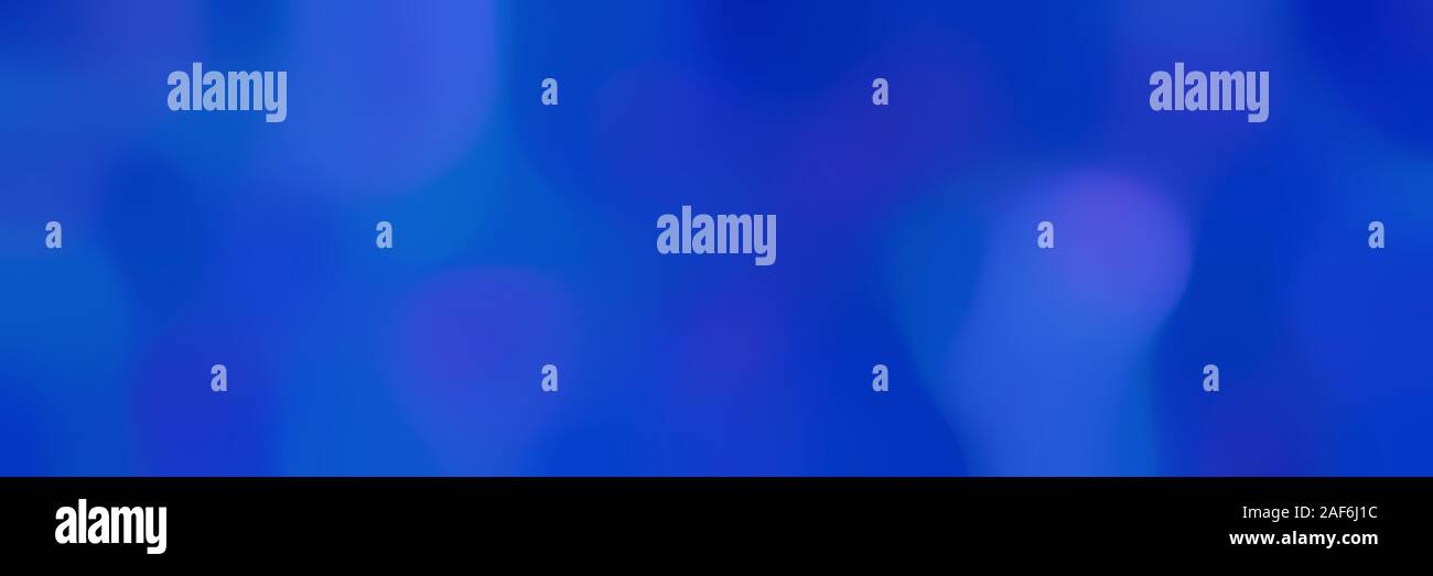 soft blurred horizontal background with strong blue, royal blue and ...