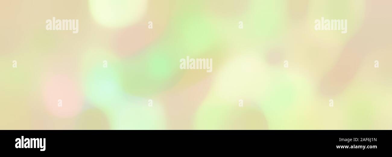 blurred horizontal background with pale golden rod, beige and tea green ...