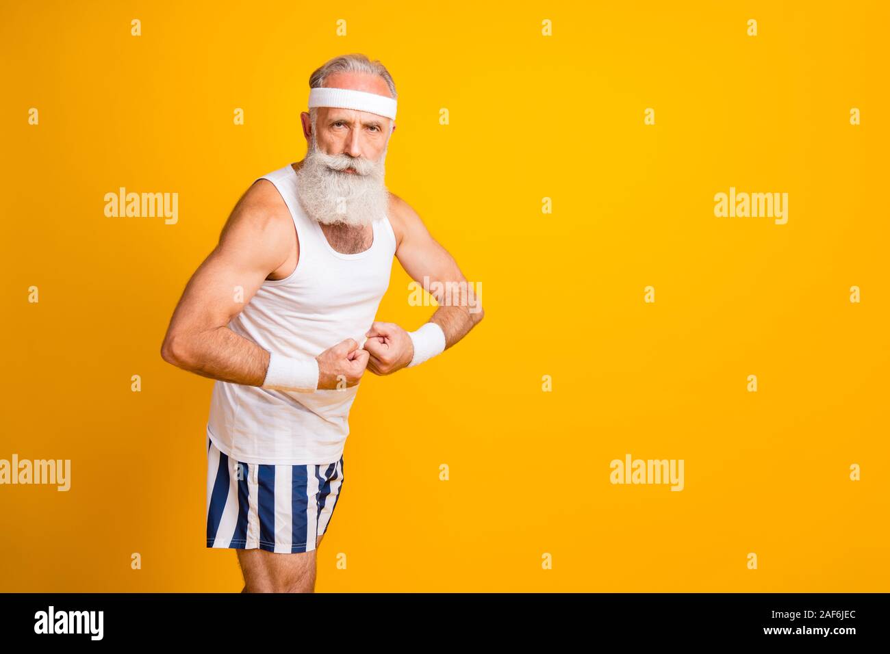 Photo of serious confident attractive mature man demonstrating his ...