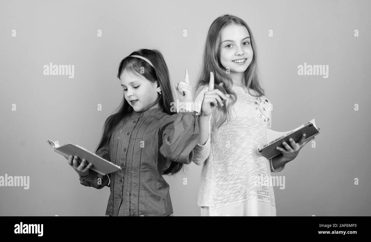Kids girls with books or notepads. Education and kids literature ...
