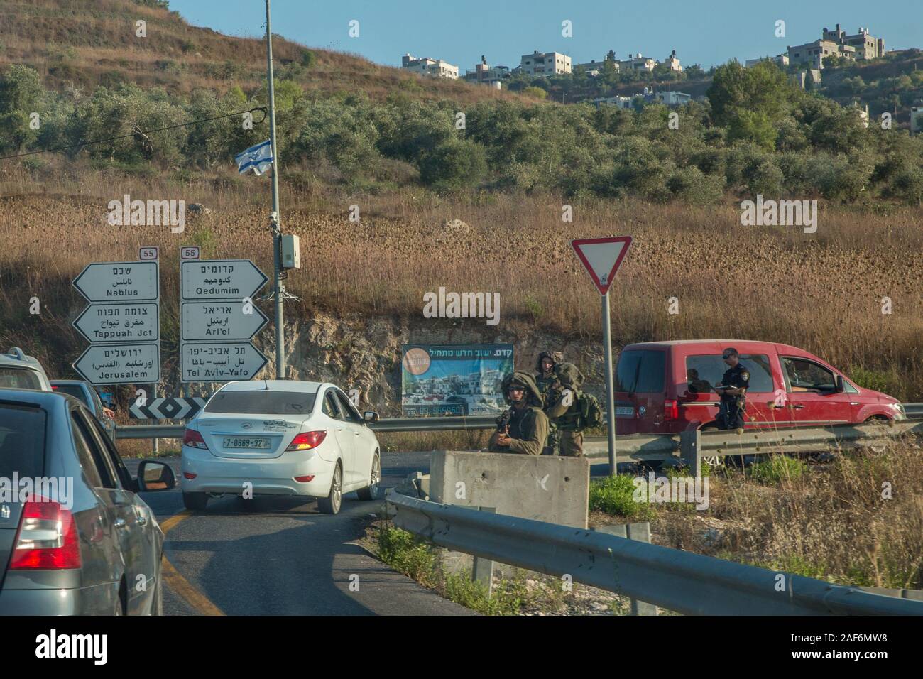 Israeli soldiers man a roadblock at a junction on road no. 55 in the ...