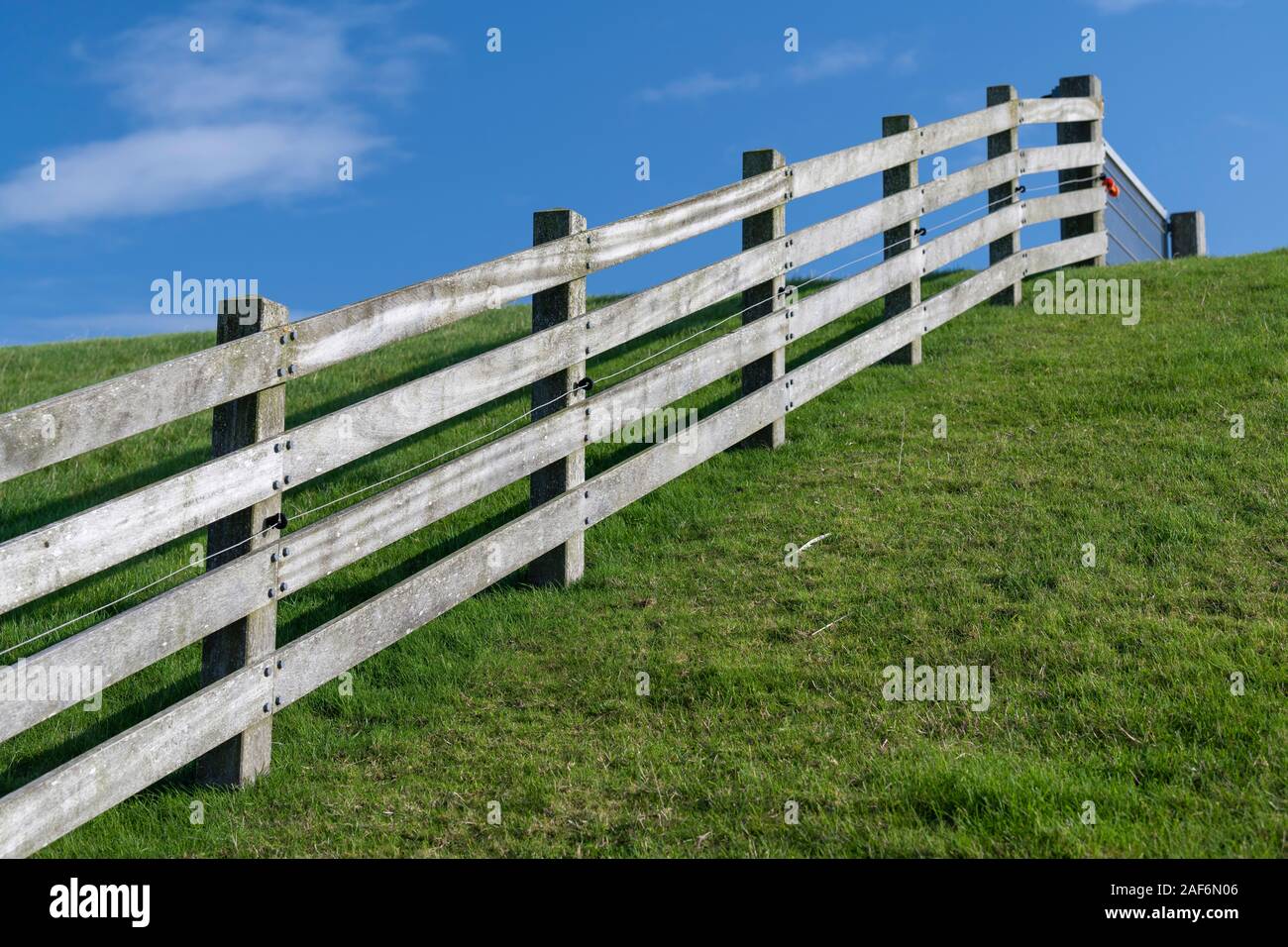 Wooden fence on the embankment of the seafront of the island of ...