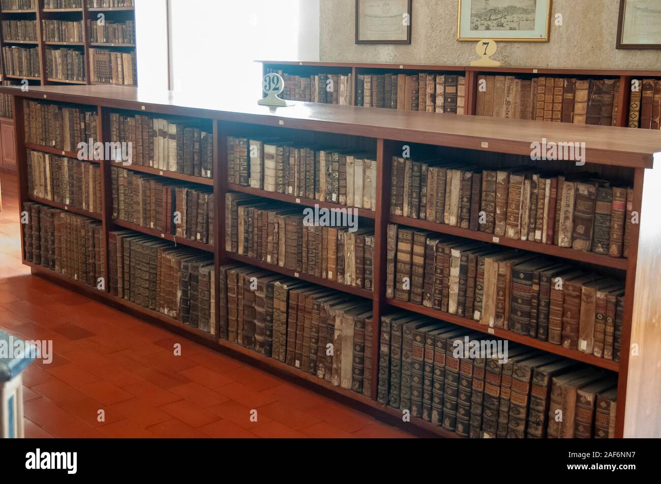 Old books on the shelves of the Joanina Library (Biblioteca Joanina) in ...
