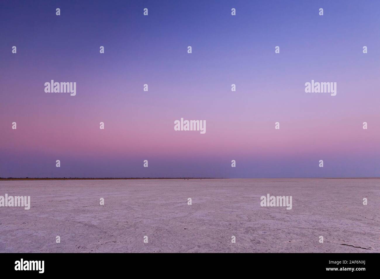 Twilight of white salt pan, dyed in the evening glow, Sowa pan, Sua pan ...