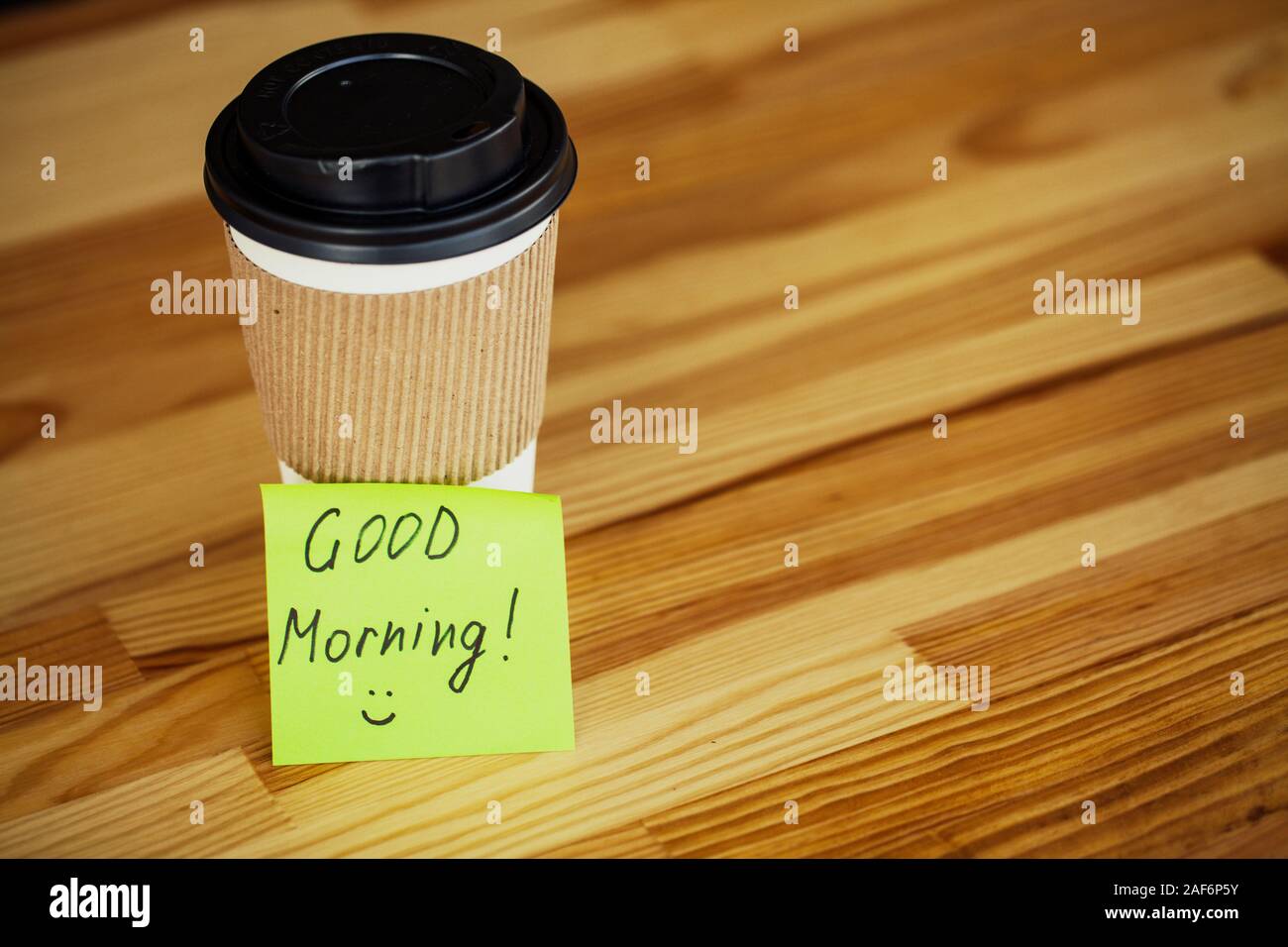Good Morning. Coffee Time. Coffee to go and beans on a wooden ...