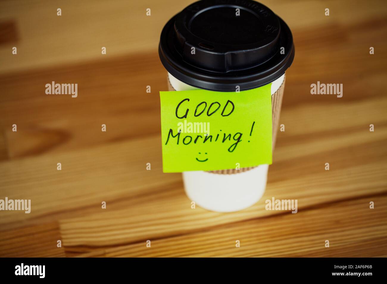 Good Morning. Coffee Time. Coffee to go and beans on a wooden ...