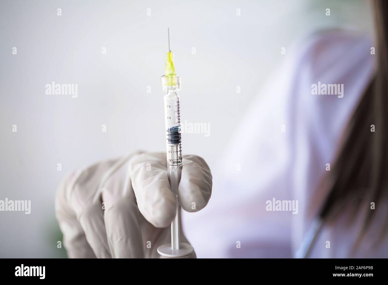 Syringe. Doctor Prepared Syringe of Vaccine to Injunction Patient Stock ...