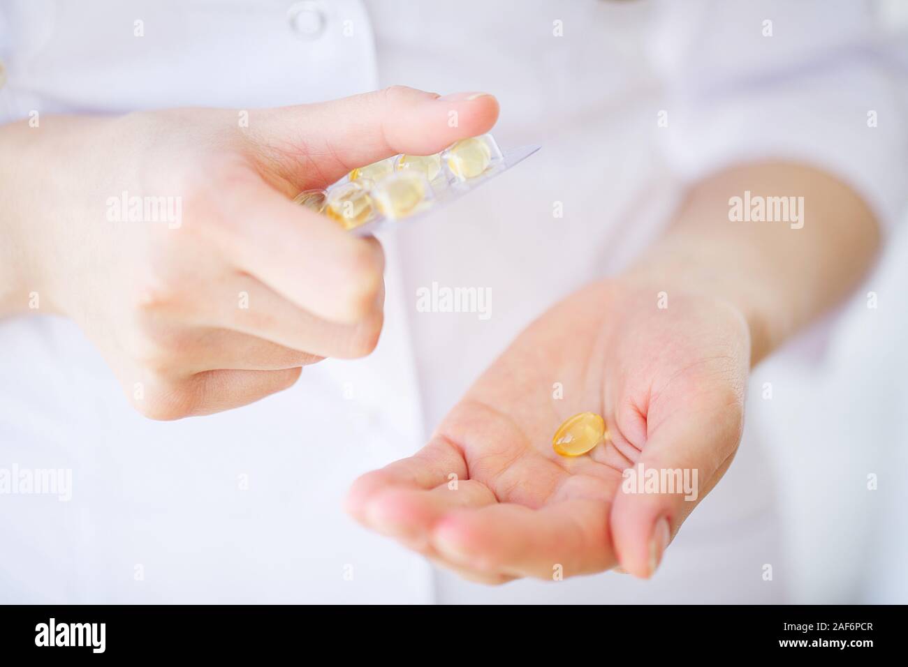 Closeup Of Woman Hands Holding Variety Of Colorful Vitamin Pills. Close ...