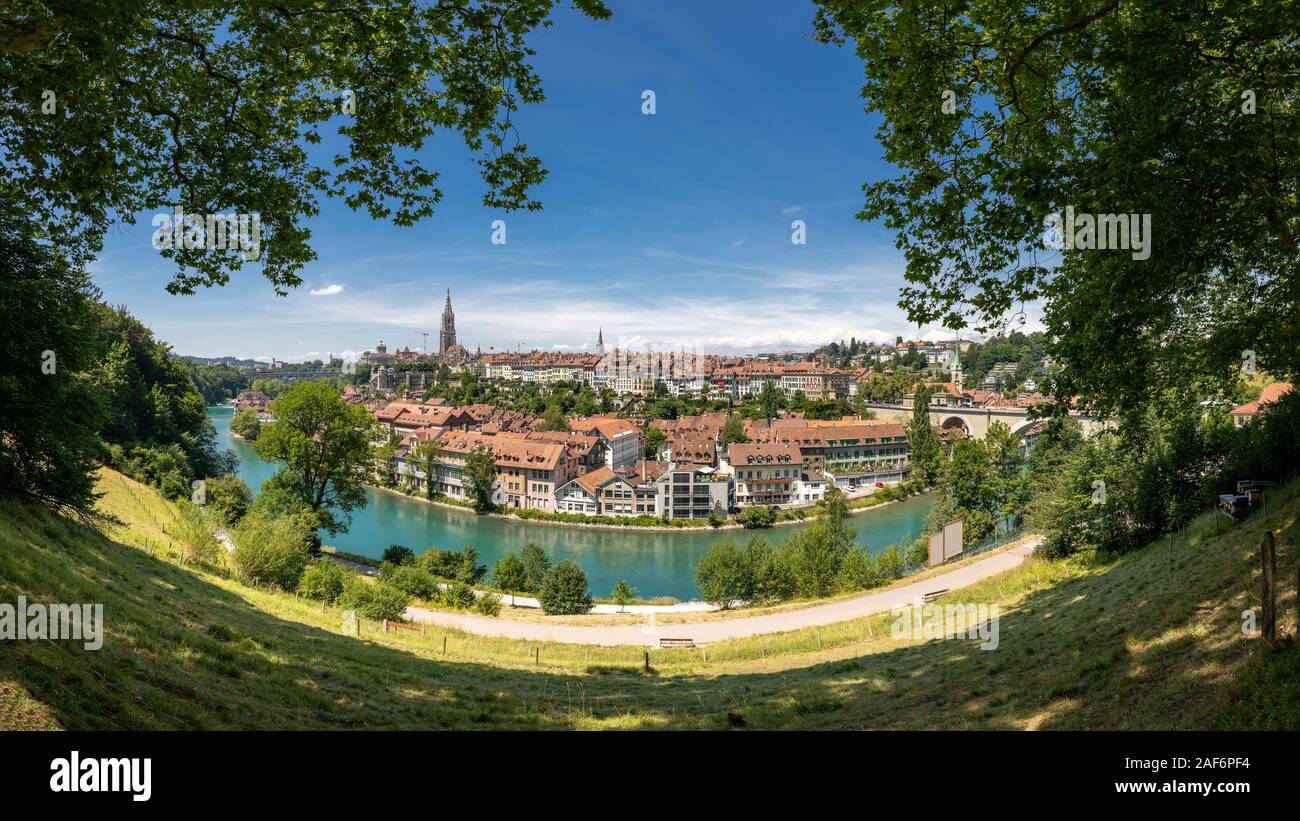 Panoramic view of the Old Town of Bern between maple tree in ...