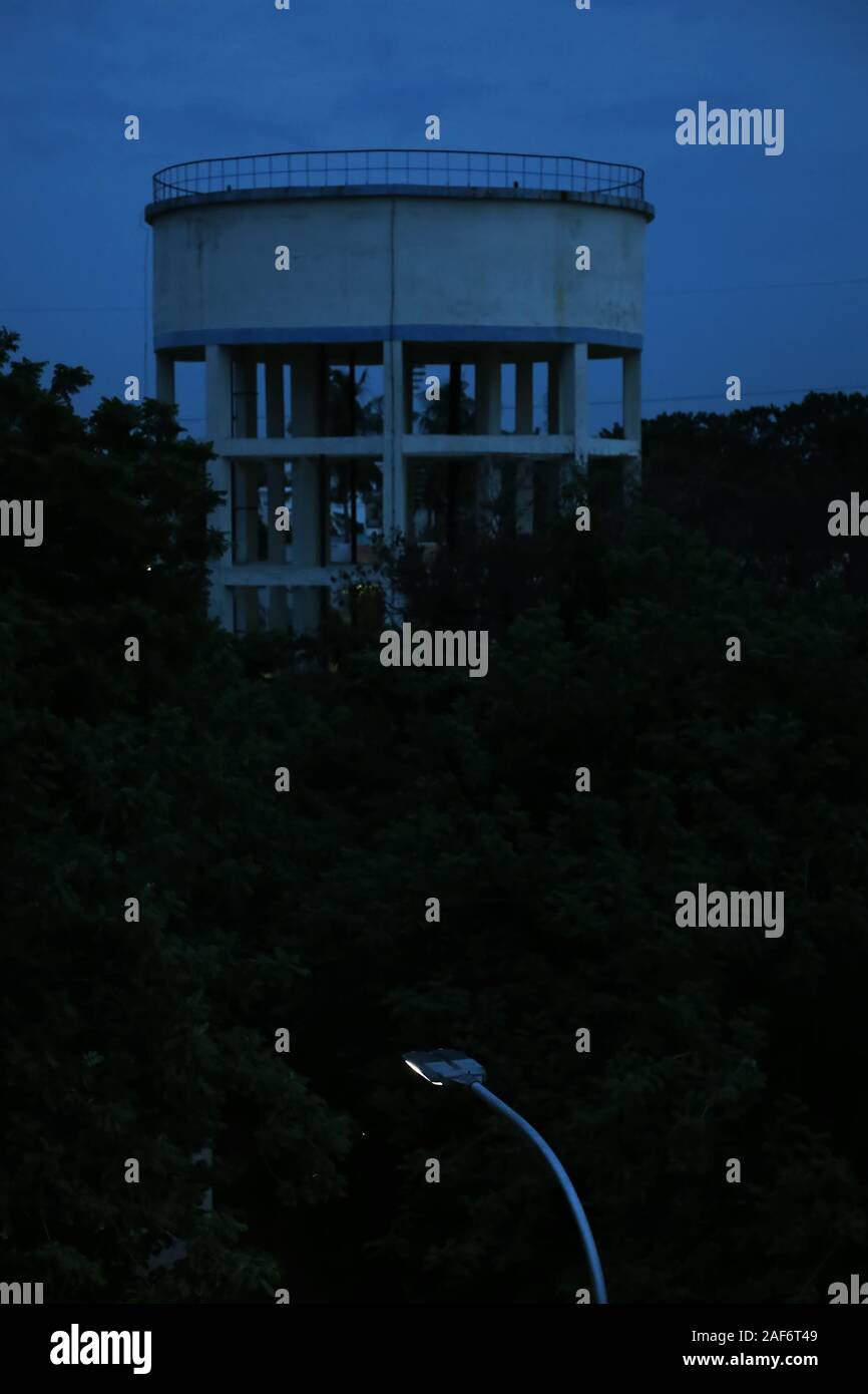 City water supply tank at India. night blue sky Stock Photo - Alamy