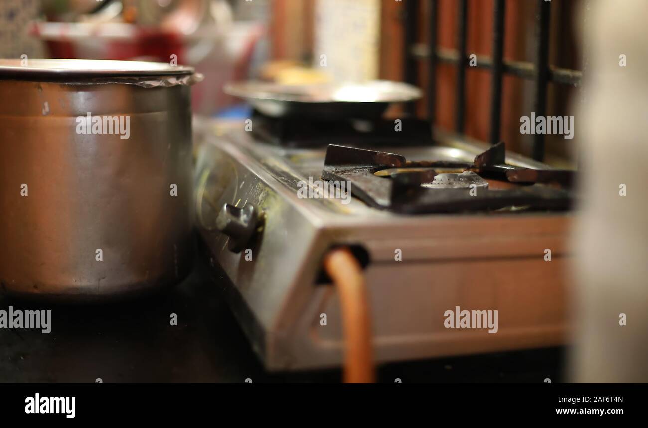 Closeup gas stove in the kitchen. Indian style Stock Photo - Alamy