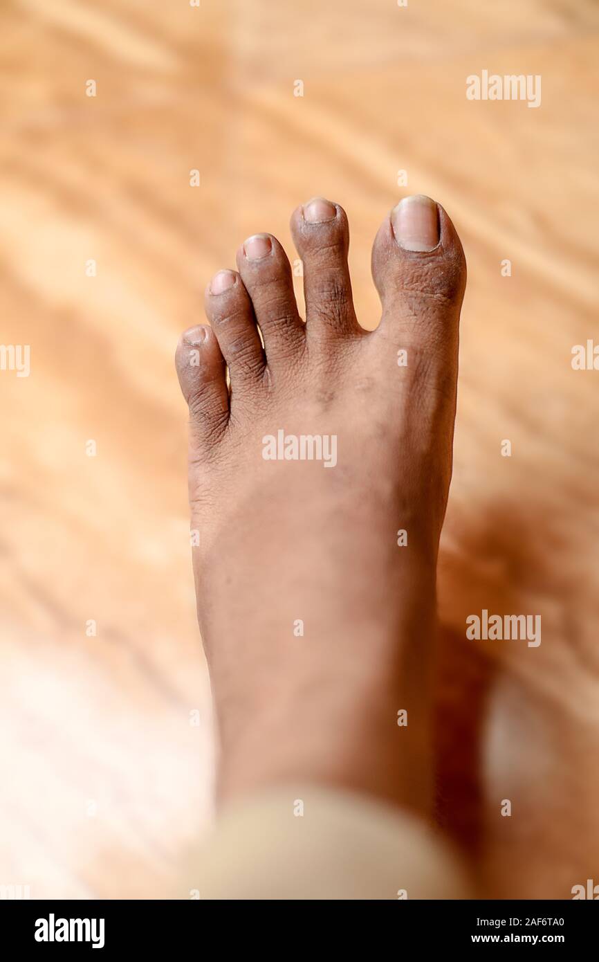 Top view barefoot on House floor tiles background. men feet Stock Photo ...