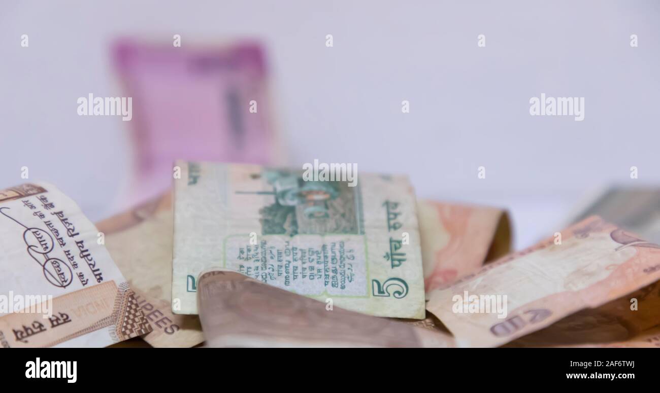 Indian currency bank notes of 5 and 10, 20, 500, 2000 rupees on white ...