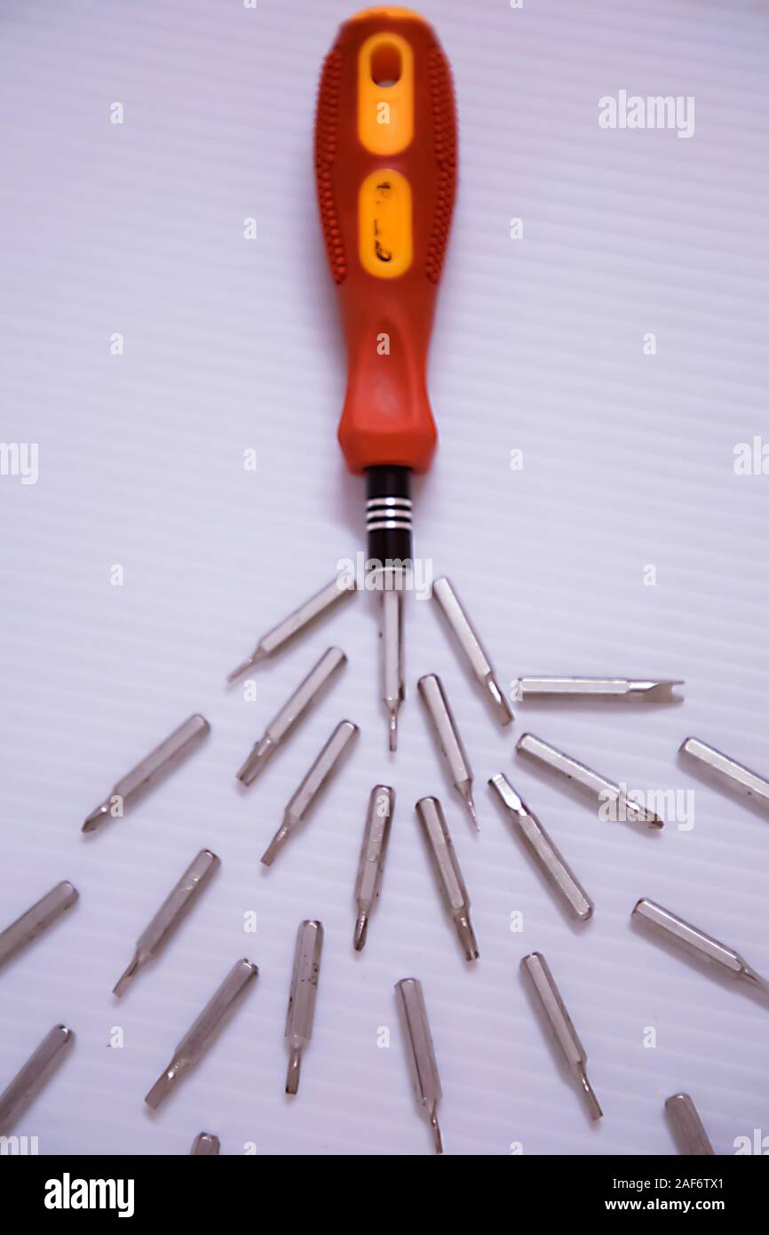 A electrical screwdriver isolated background Stock Photo - Alamy