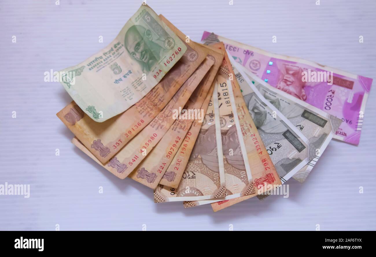 Indian currency bank notes of 5 and 10, 20, 500, 2000 rupees on white ...