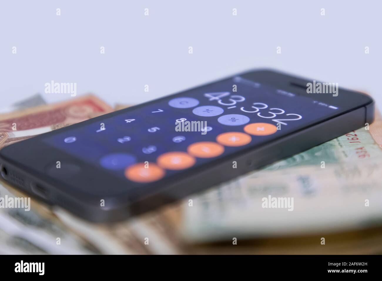 Close up view of Mobile Phone Calculate and new Indian rupees Stock ...
