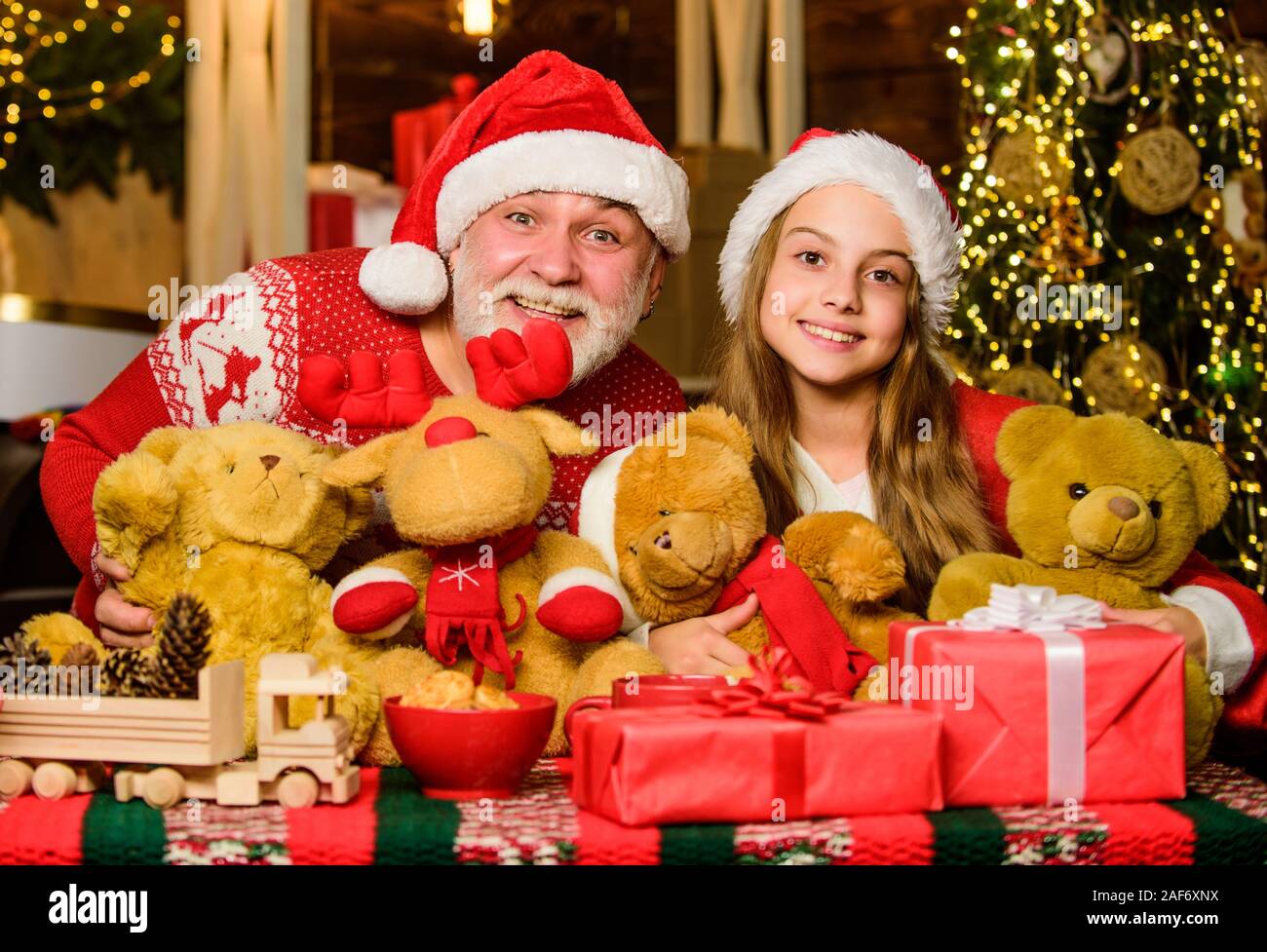 great day. family holiday weekend. small girl with santa man. xmas ...