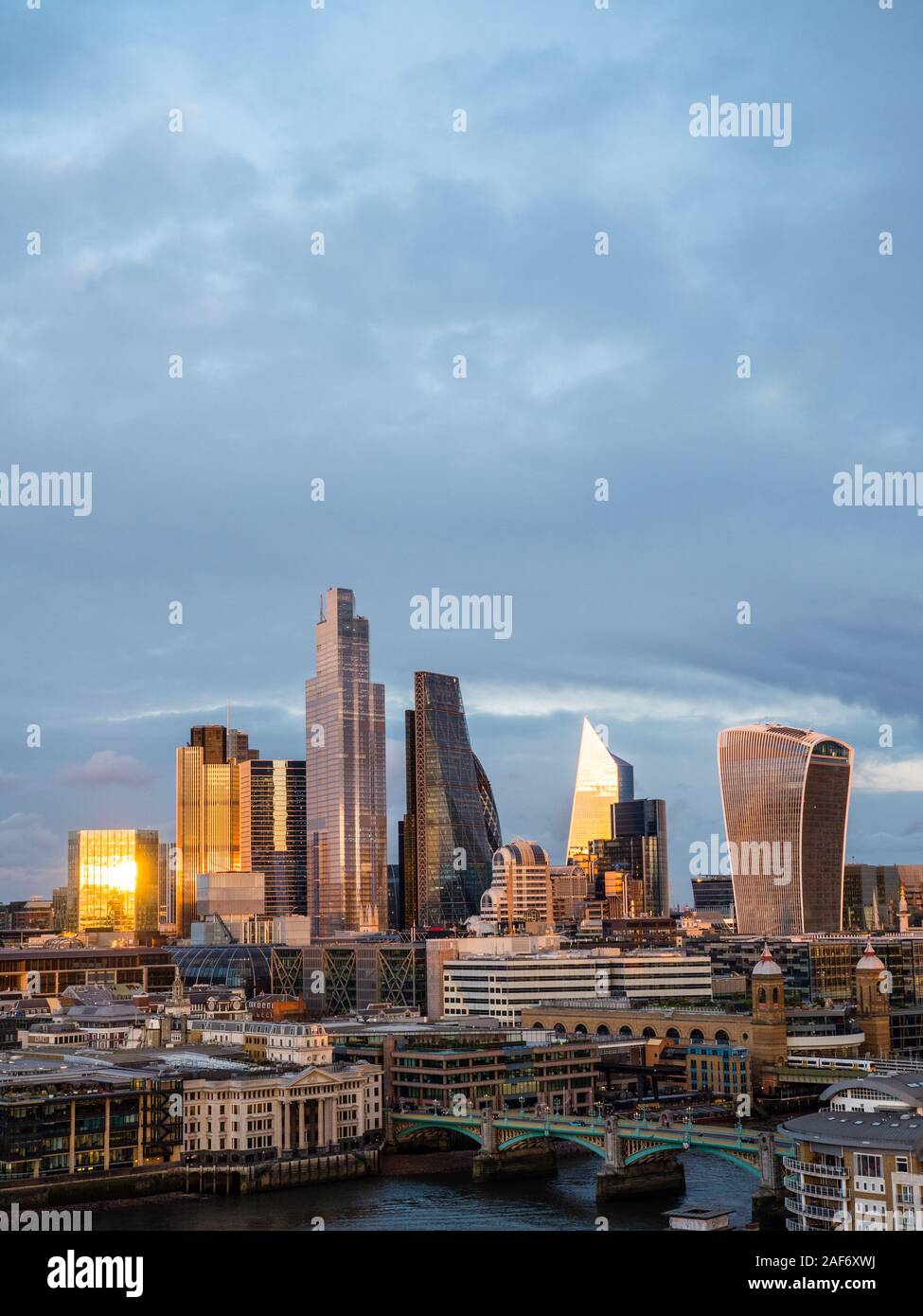 Sun Setting on The City of London, UK Business Centre, Winter Storm ...