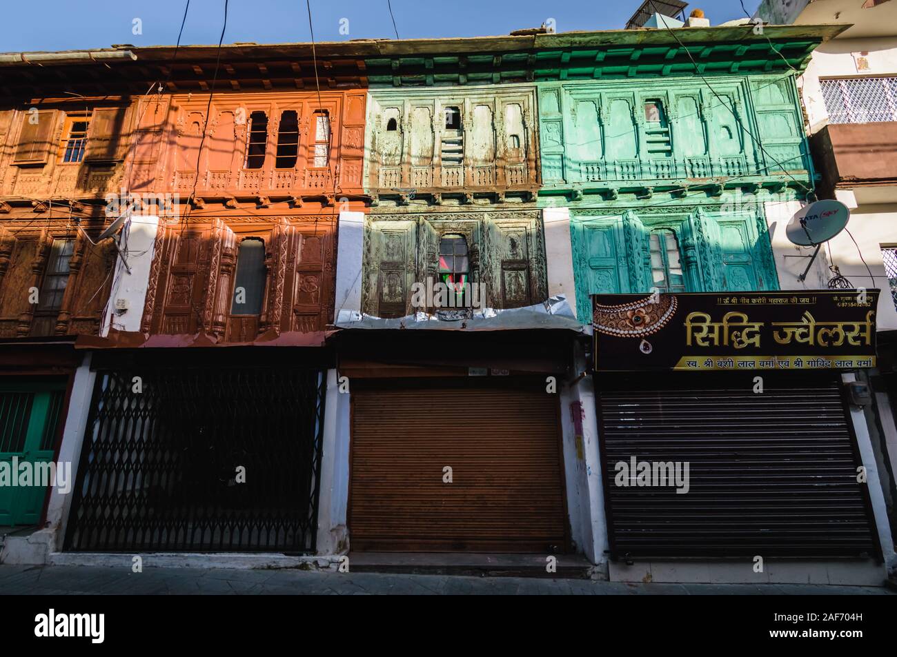 Quaint, ornate, colorful wooden galleries above the shops inside the ...