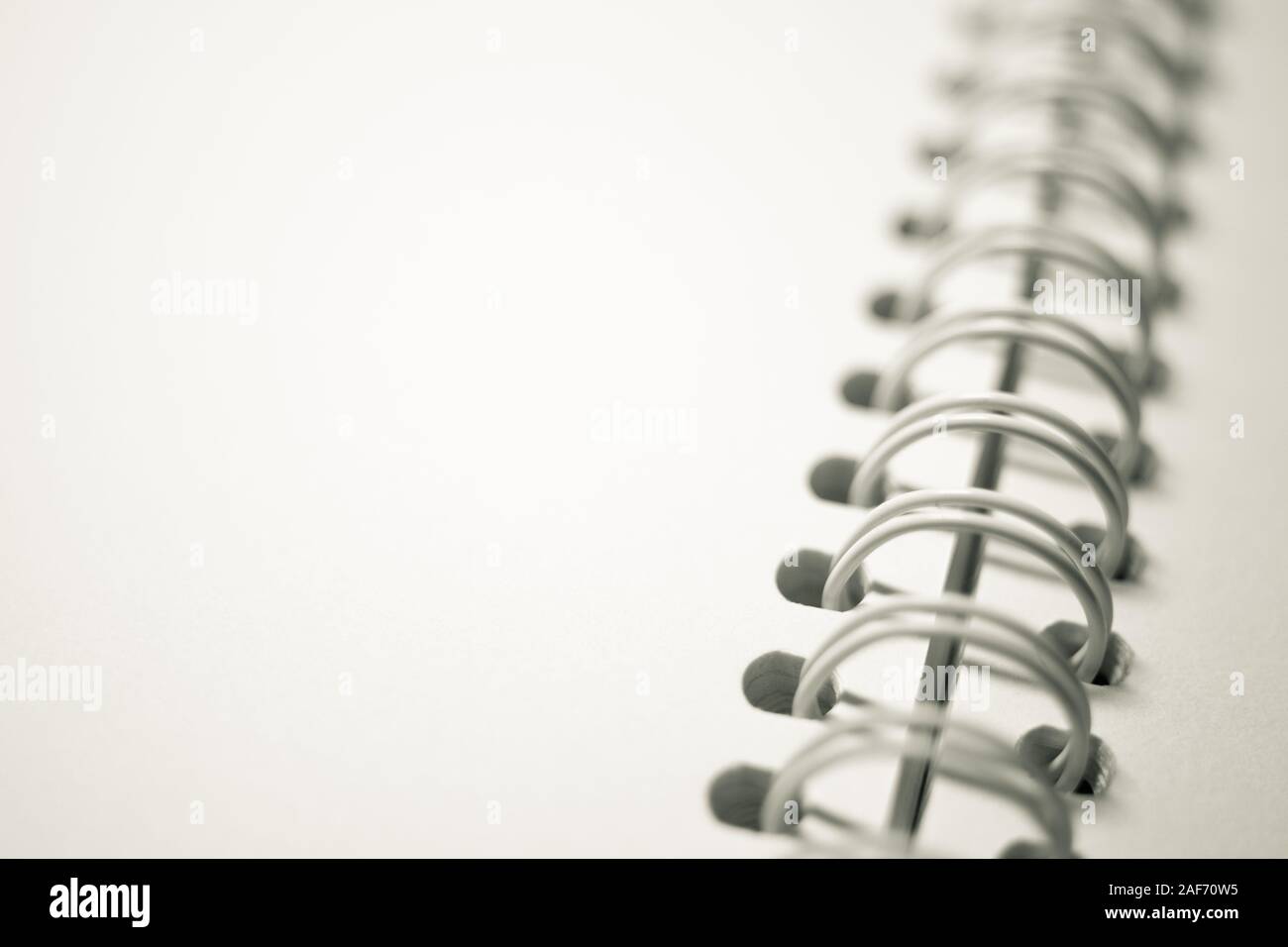 White clean paper in spiral notebook, closeup photo Stock Photo - Alamy