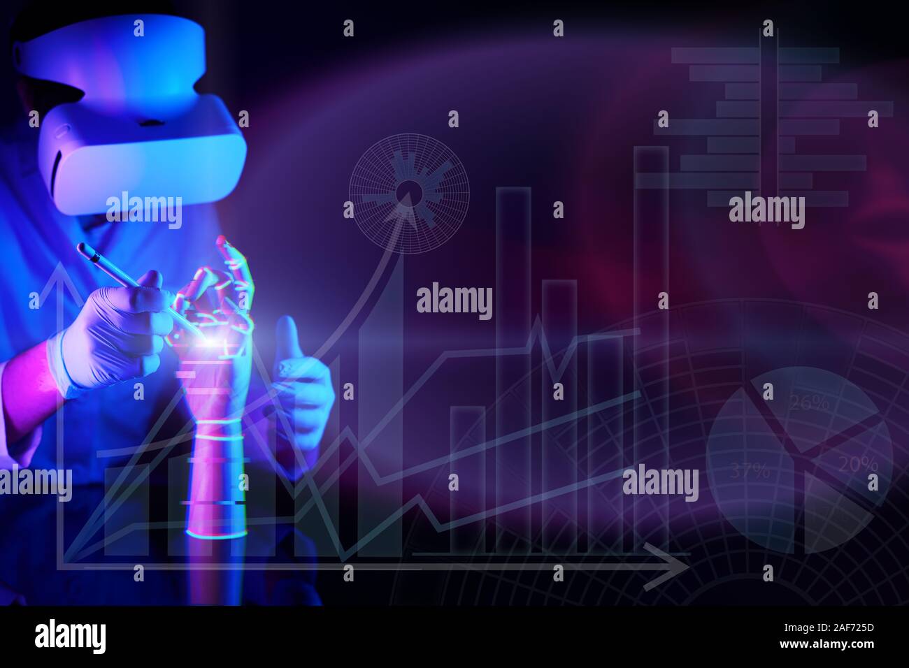 Engineer creates a robotic arm. Augmented Reality with graphics and ...