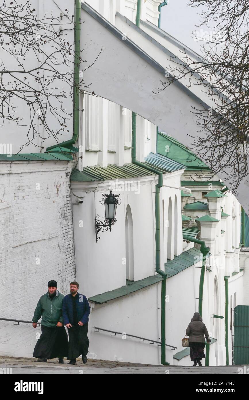 Kiev, Ukraine Monks walking on the gounds of the landmark monastery and ...