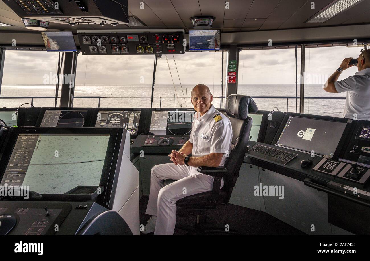 Captain Todd Burgman (born 1960 in Nebraska, USA) on the bridge of the ...
