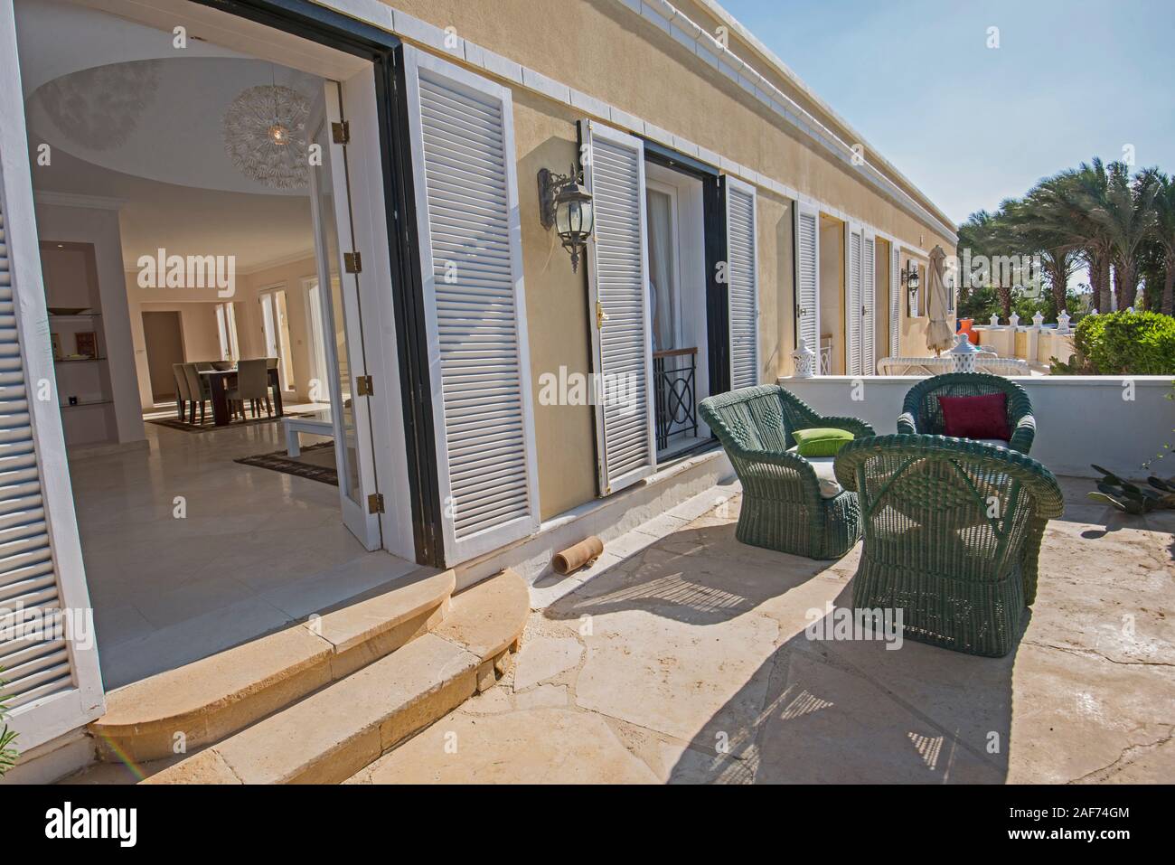 Luxury villa show home in tropical summer holiday resort with sun ...