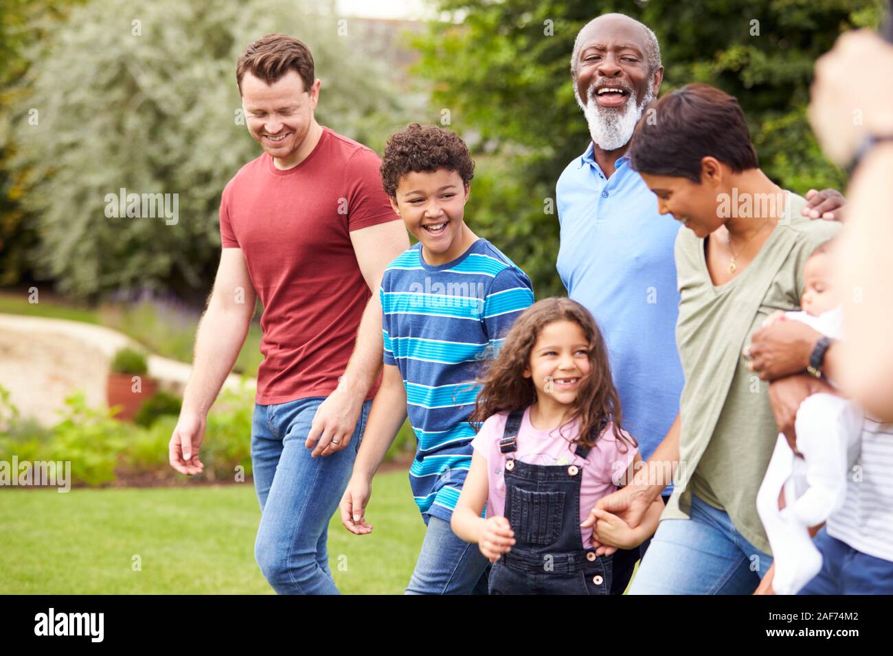 Son and baby grandson in garden hi-res stock photography and images - Alamy
