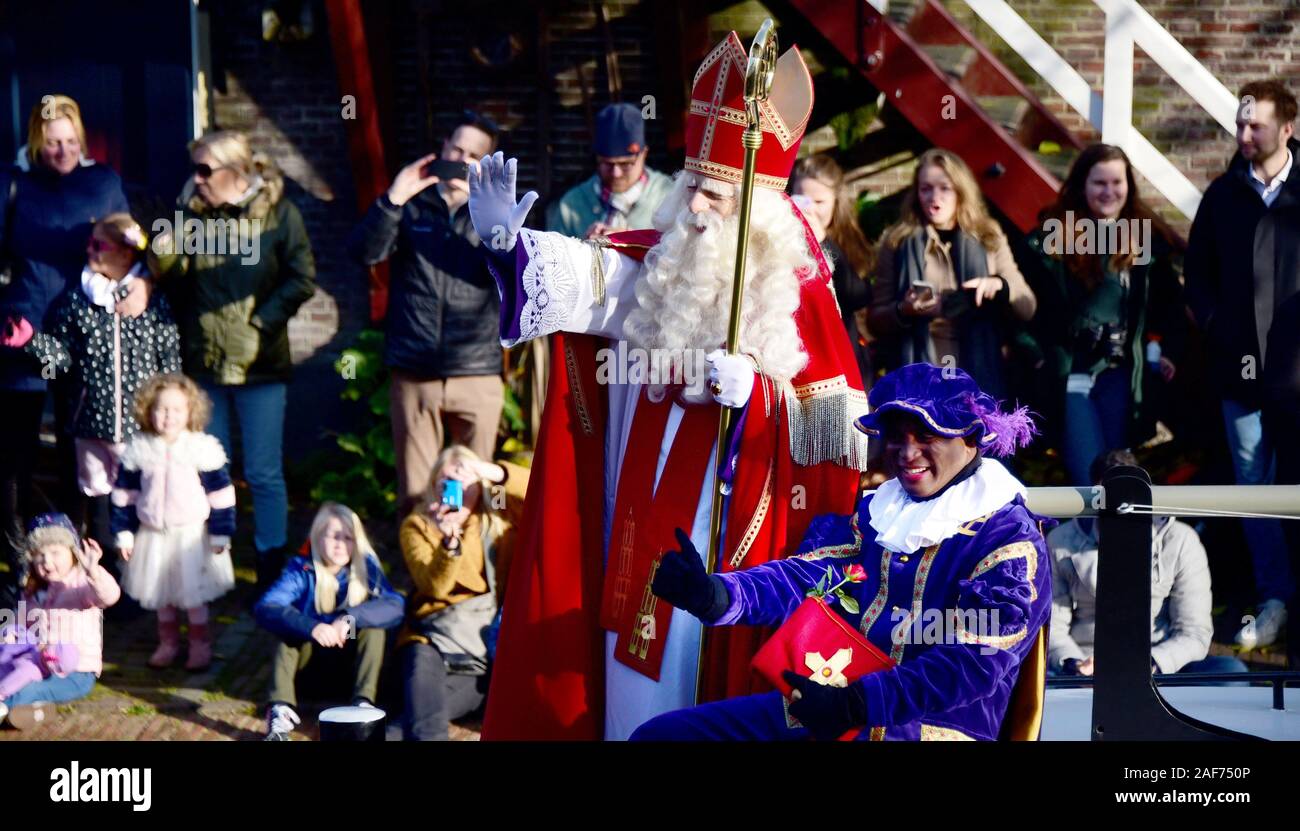 Boat parade on arrival of 'Sinterklaas' and 'Zwarte Piet' at the old ...