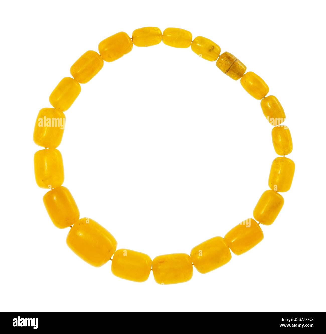 top view of vintage necklace from yellow melted amber isolated on white ...