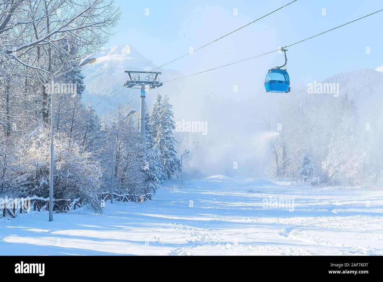 Bansko, Bulgaria winter ski resort panorama with blue gondola lift ...