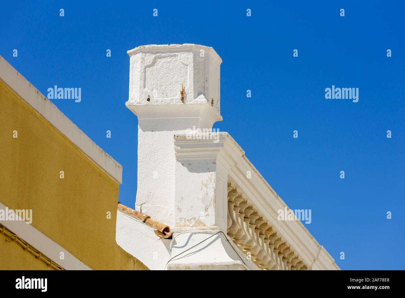 cubic chimney shape in Olhao, Algarve, portugal Stock Photo - Alamy