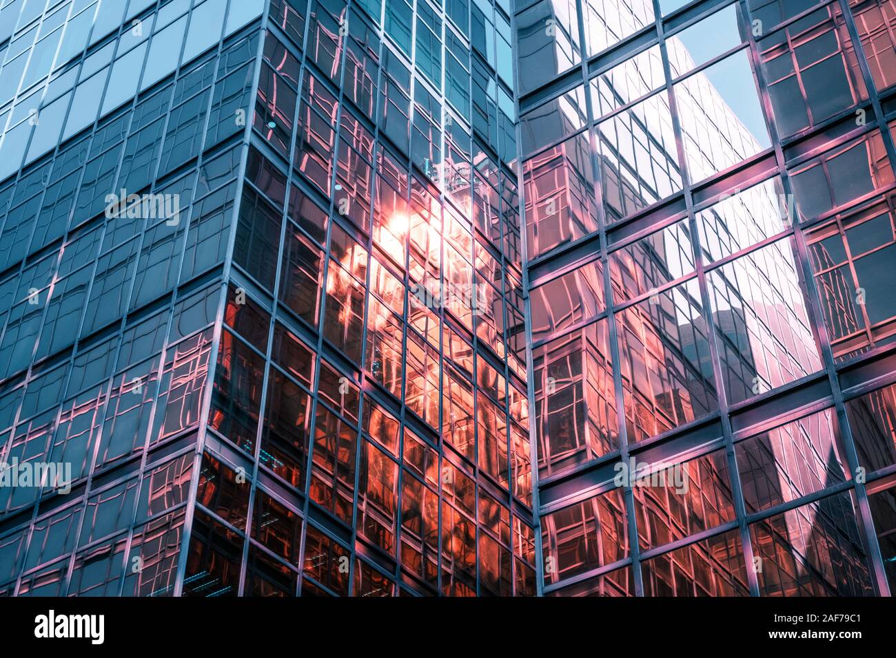 Reflection in modern glass facade of skyscraper building Stock Photo ...