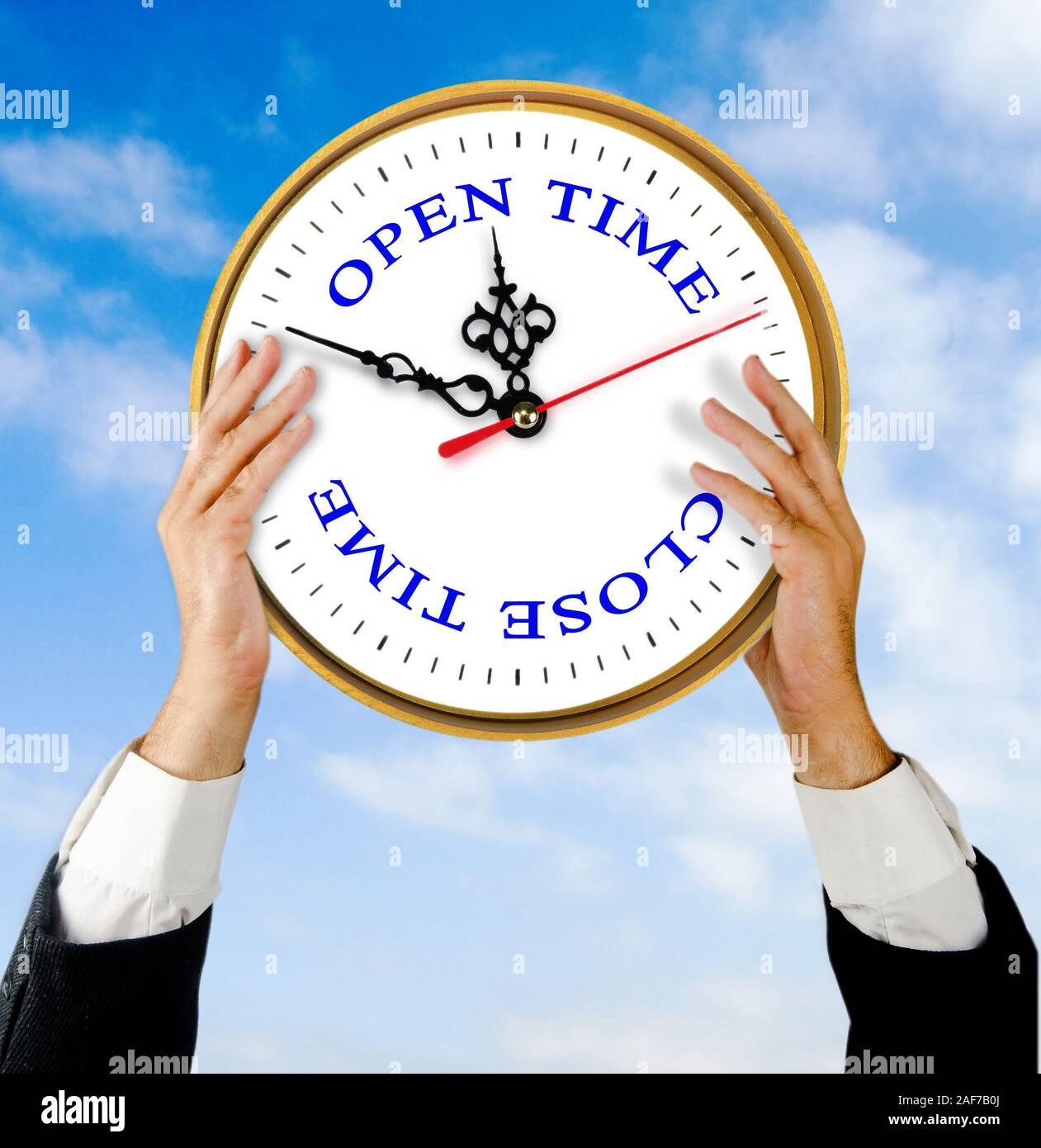 Clock showing open and close time Stock Photo - Alamy