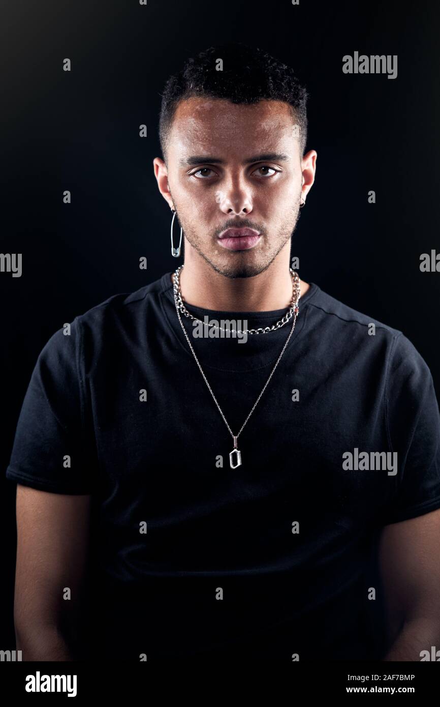 Studio Portrait Of Young Man With Skin Pigmentation Disorder Looking At ...